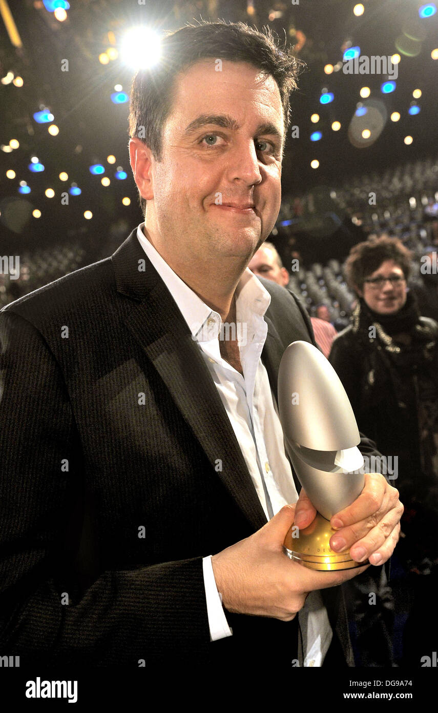 Cologne, Germany. 15th Oct, 2013. German actor Bastian Pastewka poses ...