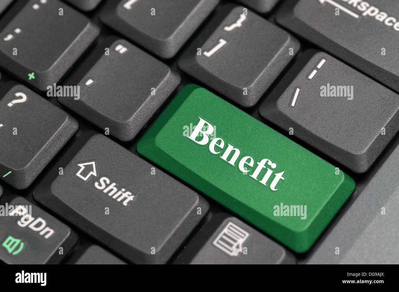 Benefit key on keyboard Stock Photo - Alamy