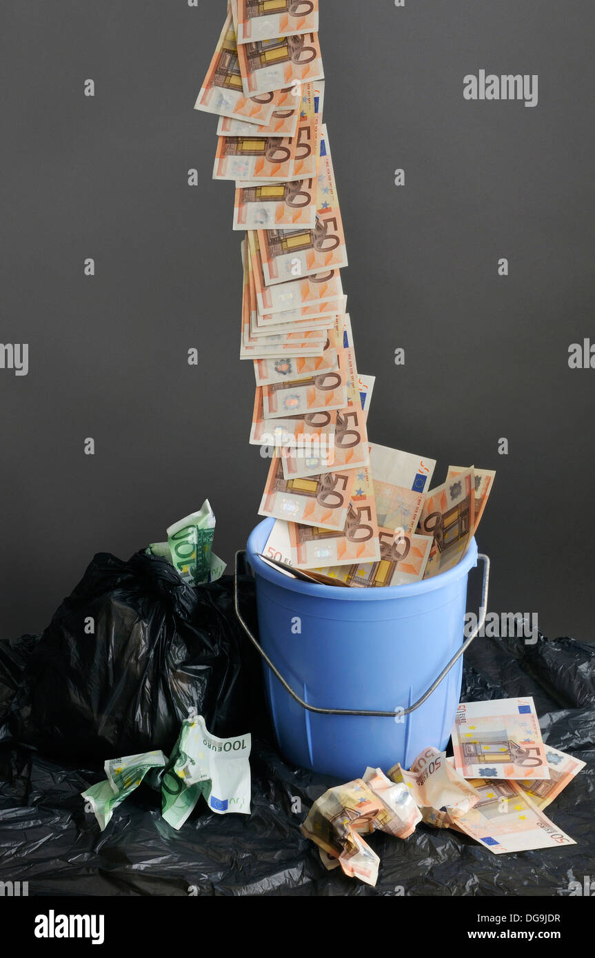 Money Down Drain Stock Photos & Money Down Drain Stock Images - Alamy
