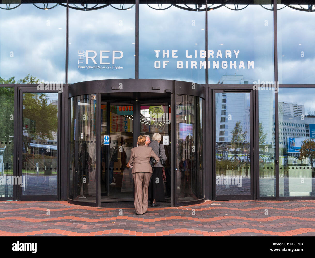 Birmingham Library, with people walking through rotating door ...