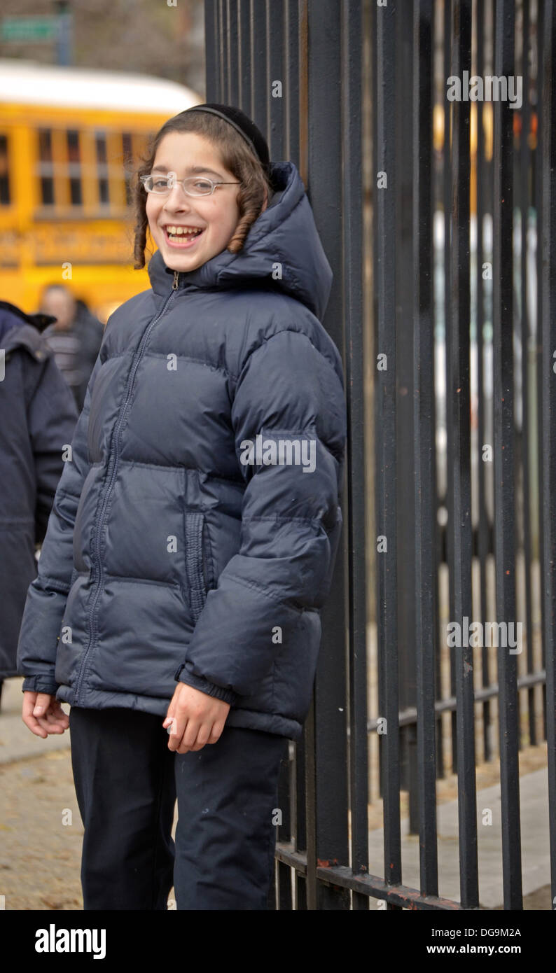 Portrait of a happy religious Jewish boy with long side locks - peyot ...