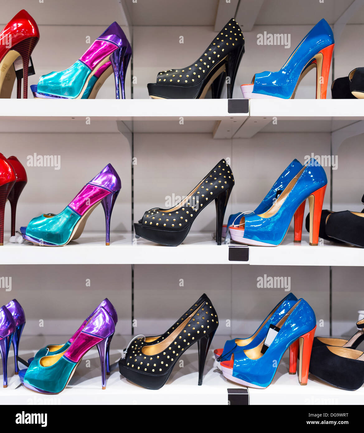 Background with shoes on shelves of shop Stock Photo - Alamy