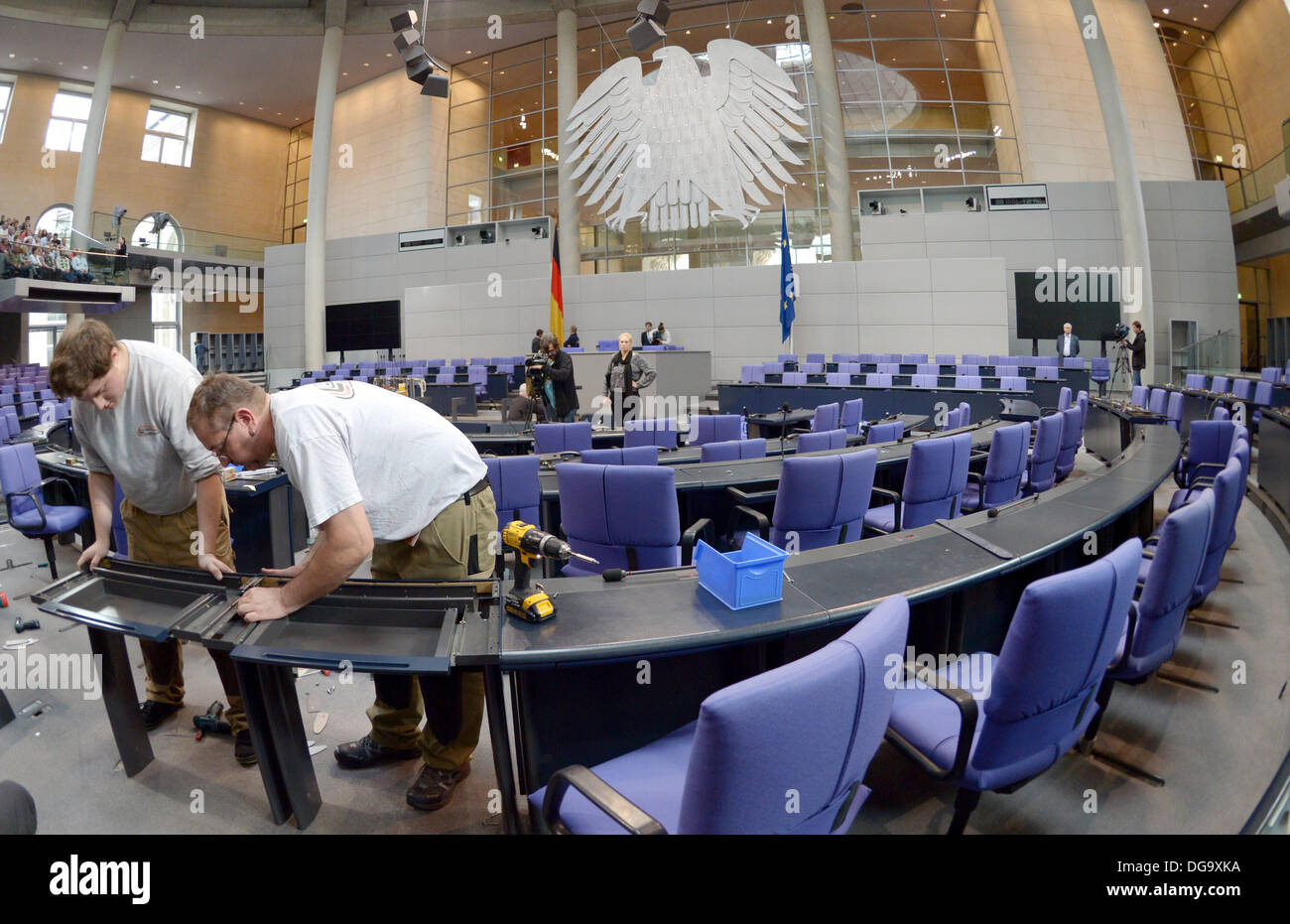 Berlin, Germany. 17th Oct, 2013. Chairs and tables are installed in the ...