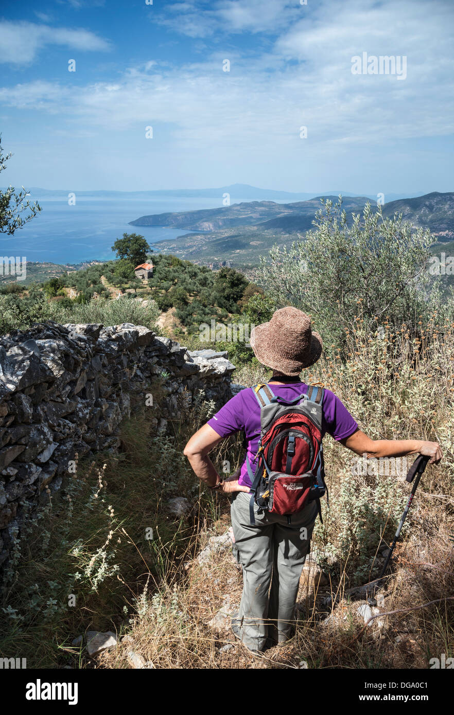 A walker takes in the view on a path above Exohori in the Outer Mani ...
