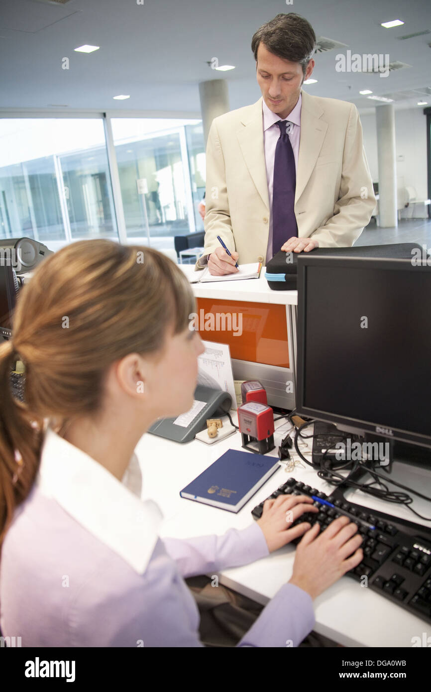 Male receptionist notes hi-res stock photography and images - Alamy