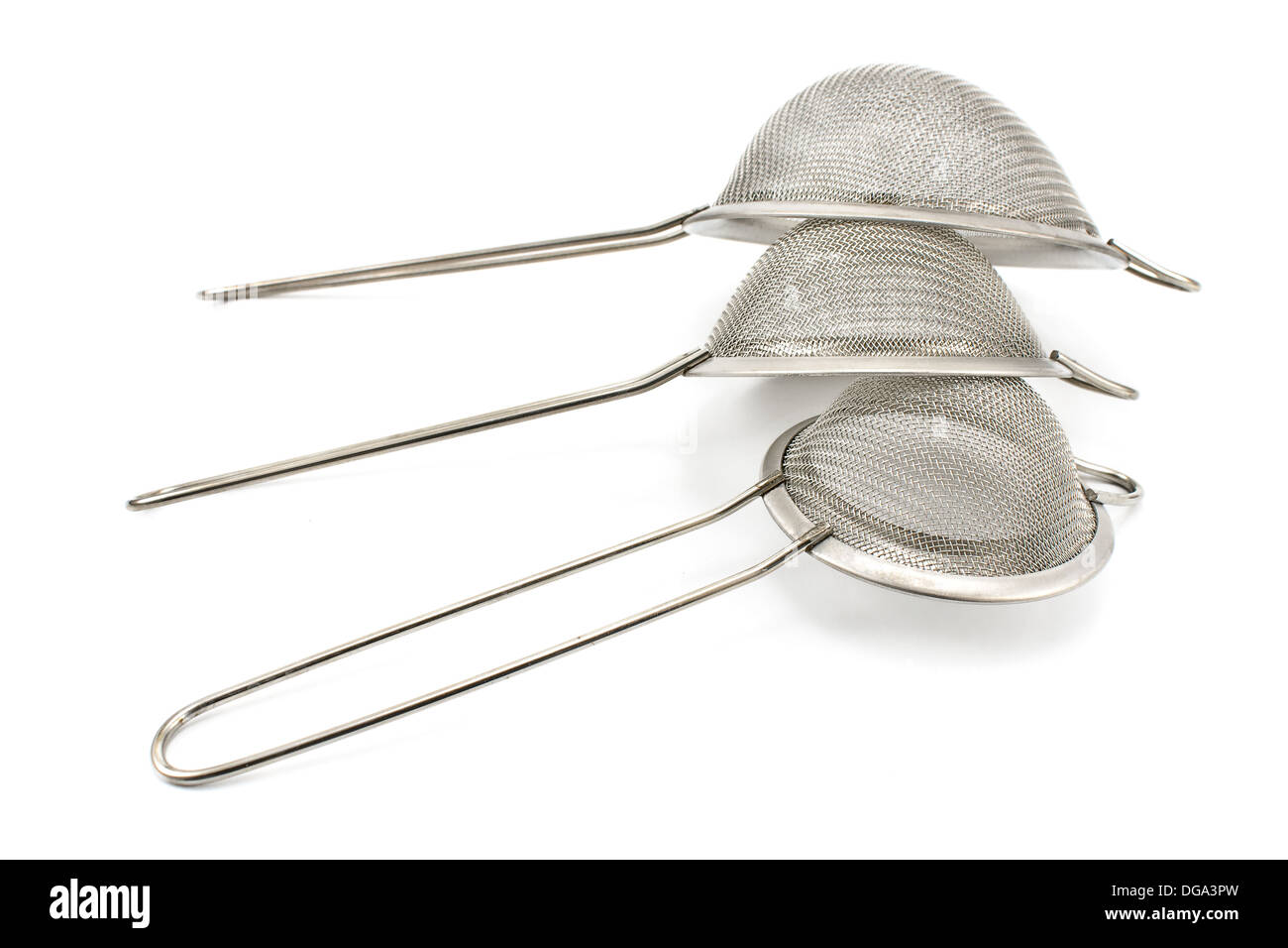 Three colanders isolated on a white Stock Photo - Alamy