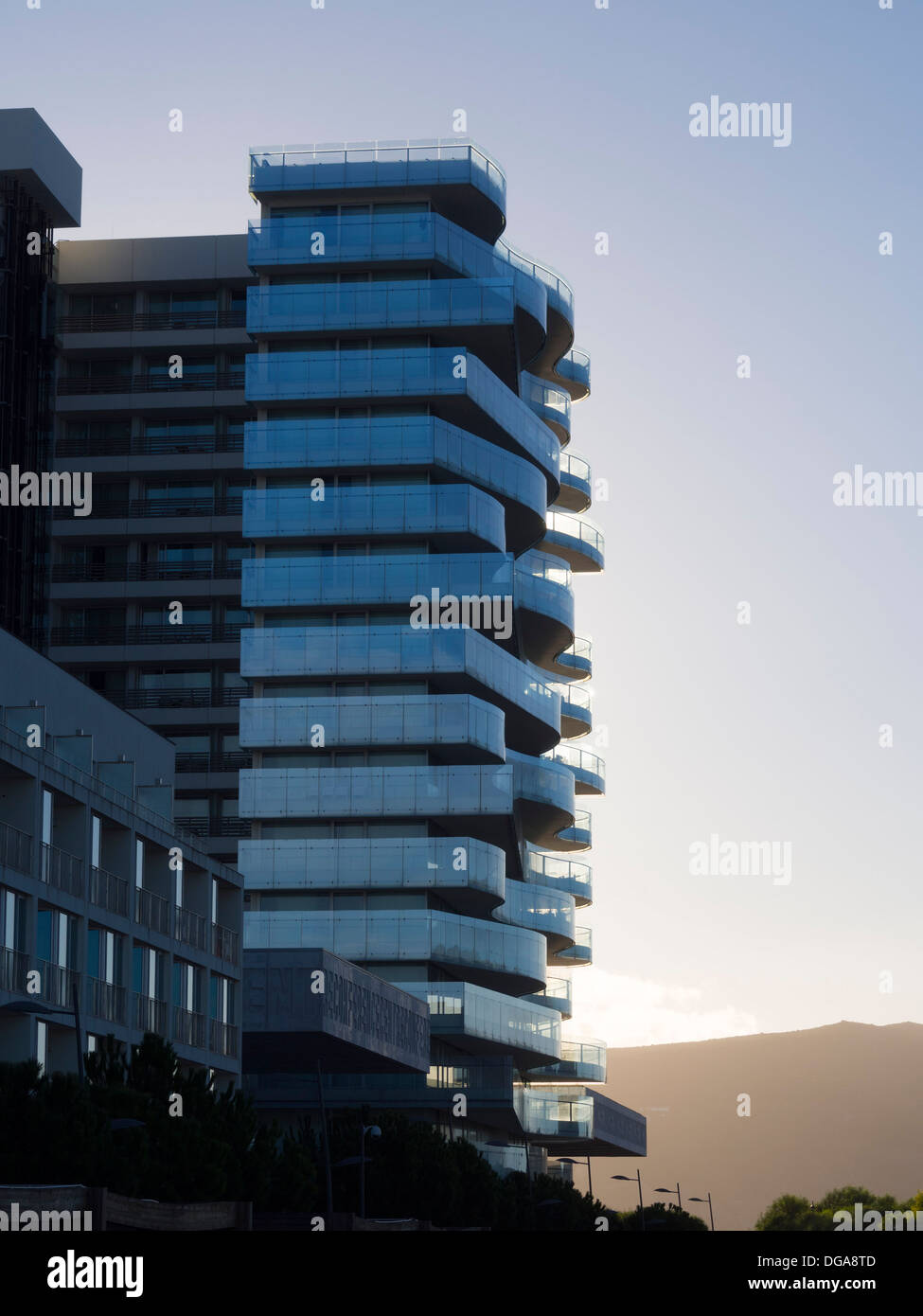Building with modern architecture and curved glass balconies Stock ...