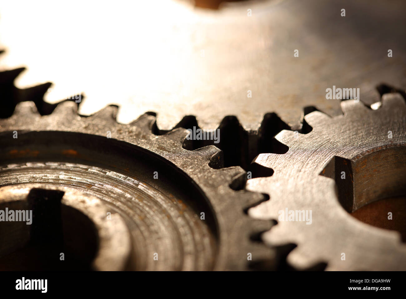 Three steel cogwheels in connection Stock Photo - Alamy