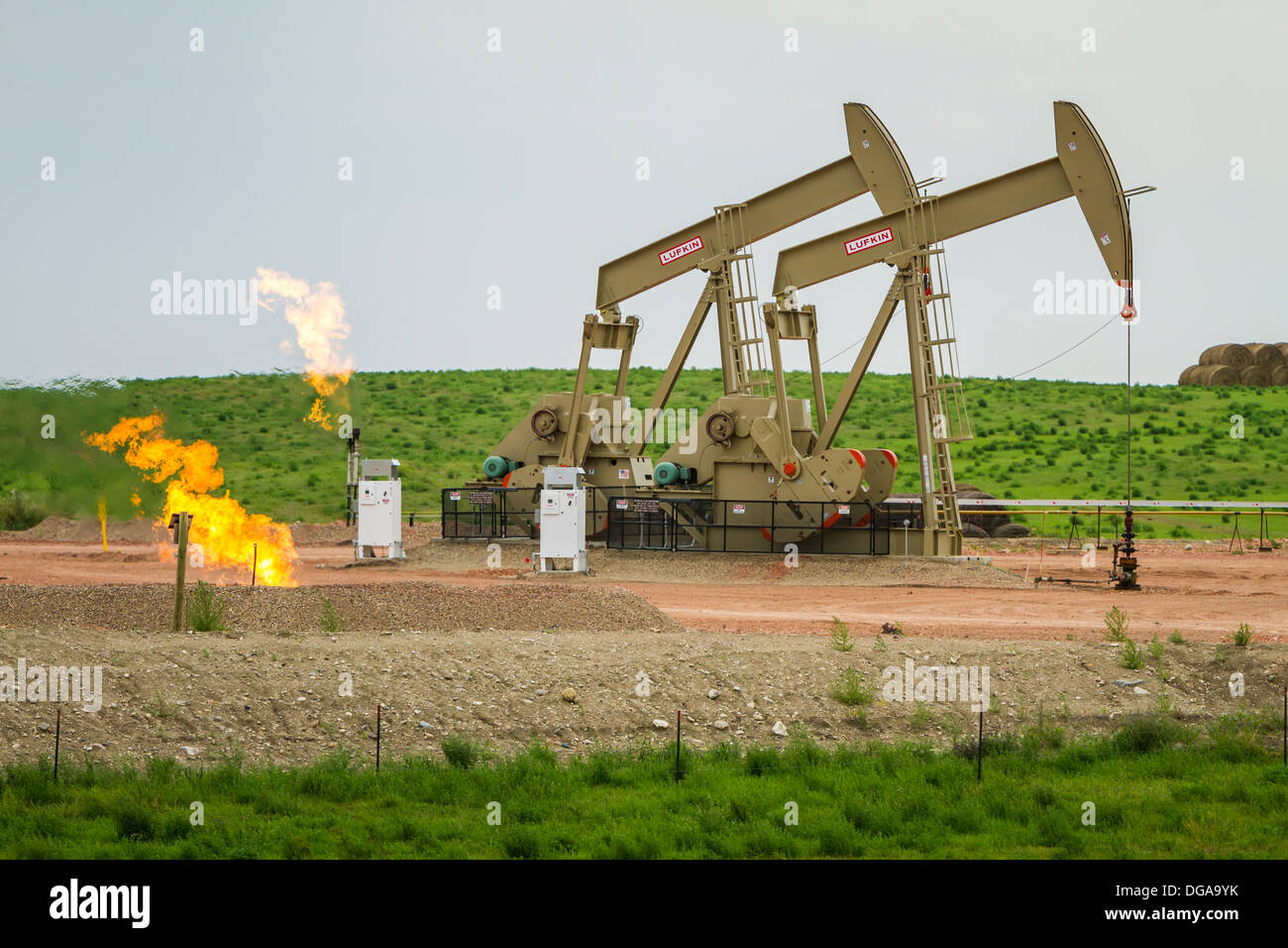 Oil pumpers and flaring natural wells in the Bakken play oil fields ...