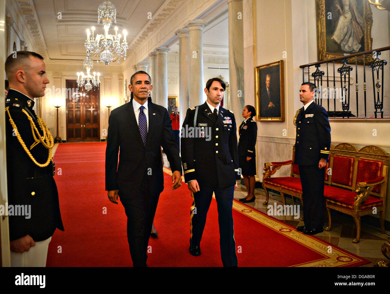 US President Barack Obama escorts Former US Army Capt. William D ...