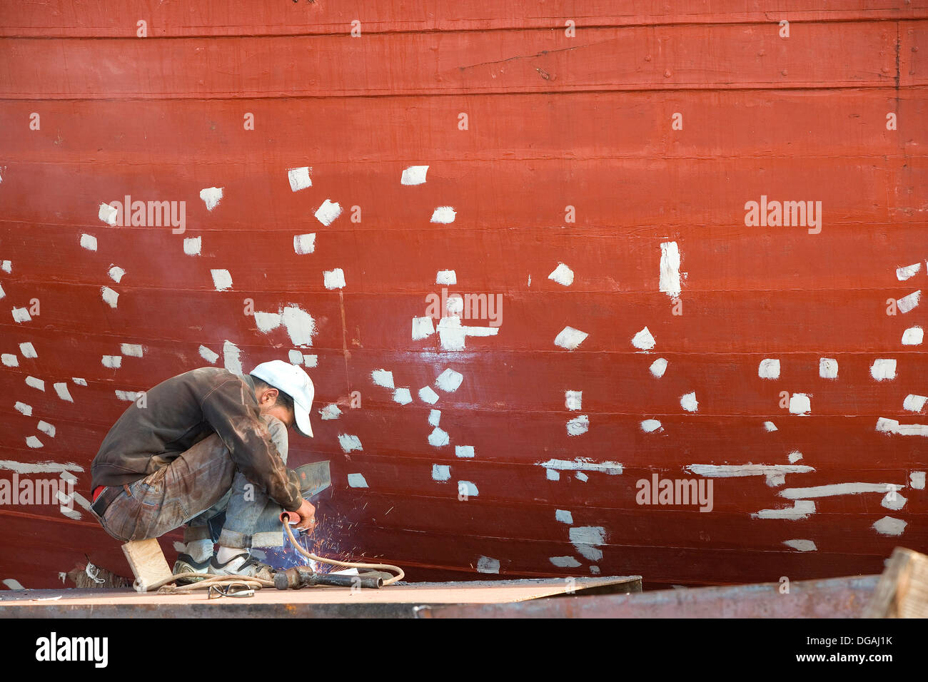 Morocco man repairing boat hi-res stock photography and images - Alamy