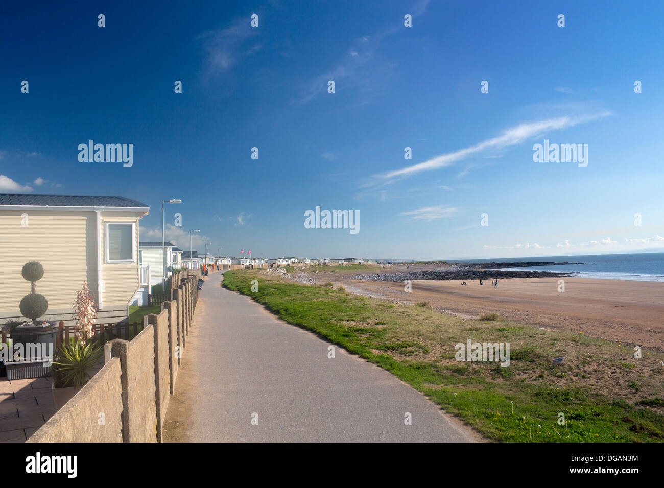 Trecco Bay beach and holiday park mobile homes and caravans along shore ...