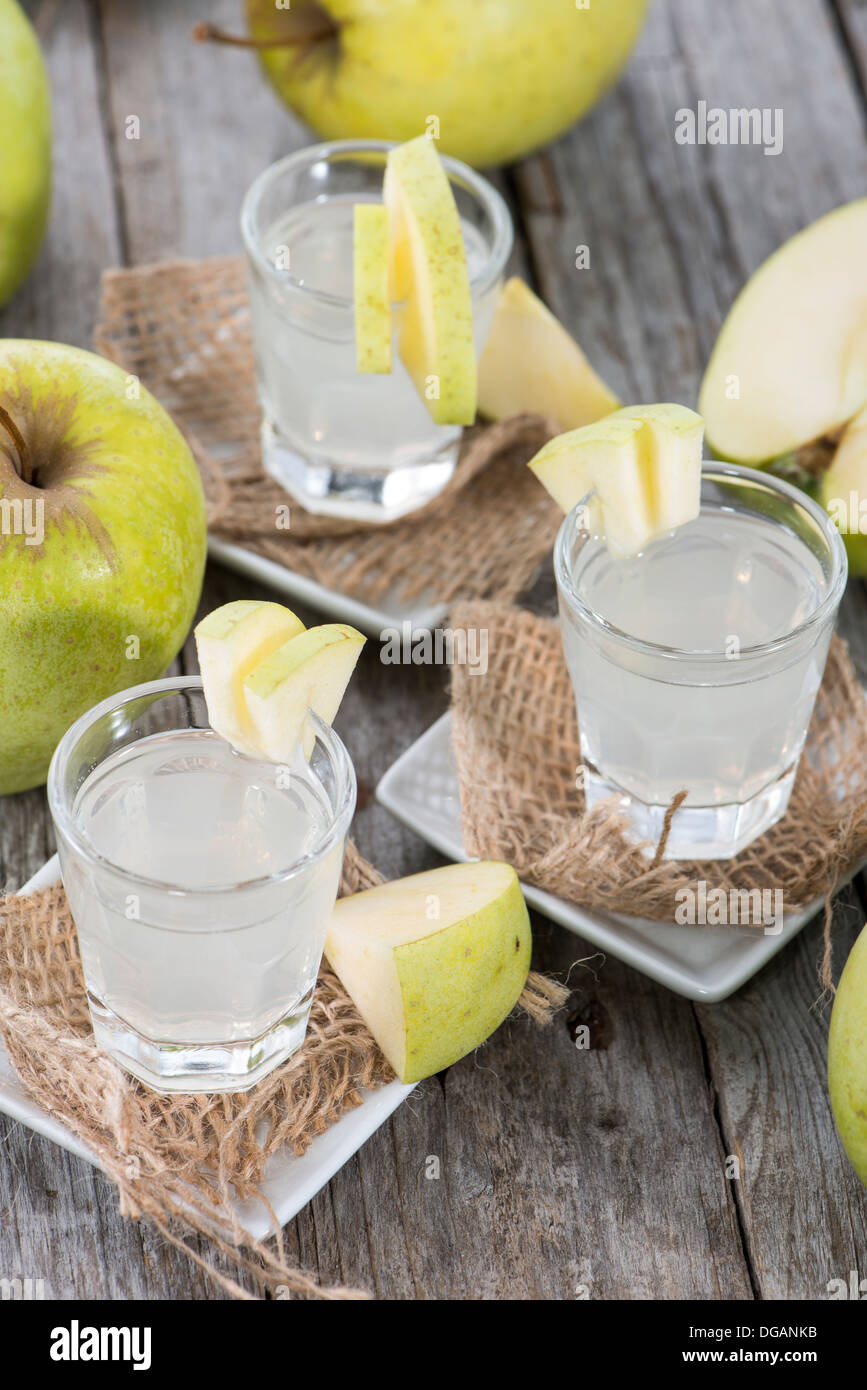 Fresh homemade Apple Liqueur with some fruits Stock Photo - Alamy