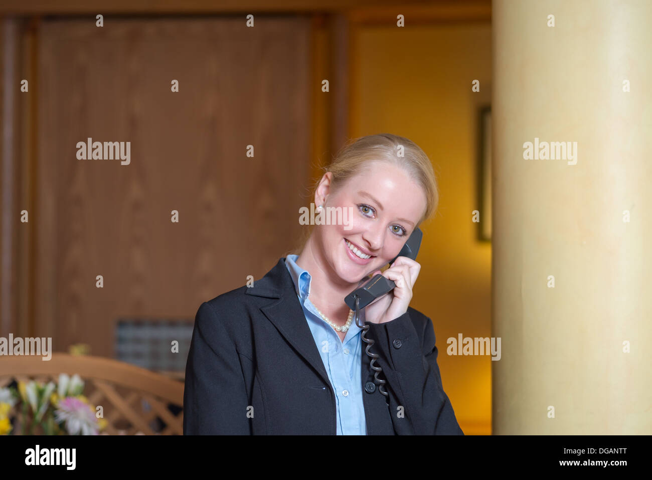 Receptionist Answering Phone Stock Photos & Receptionist Answering ...