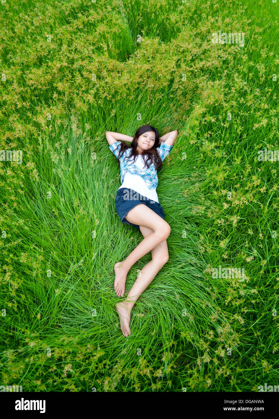 this girl is lying on the meadow and chilling out with her life Stock ...