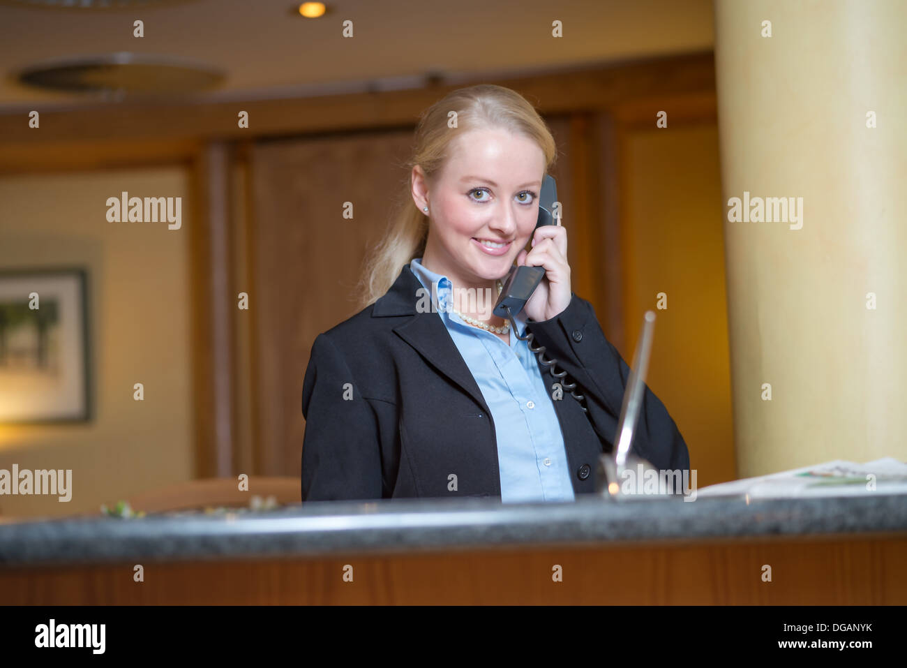 Receptionist Answering Phone Stock Photos & Receptionist Answering ...