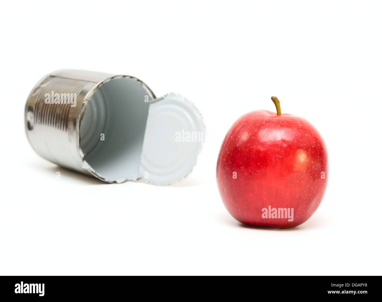 Can and apple isolated on white Stock Photo - Alamy
