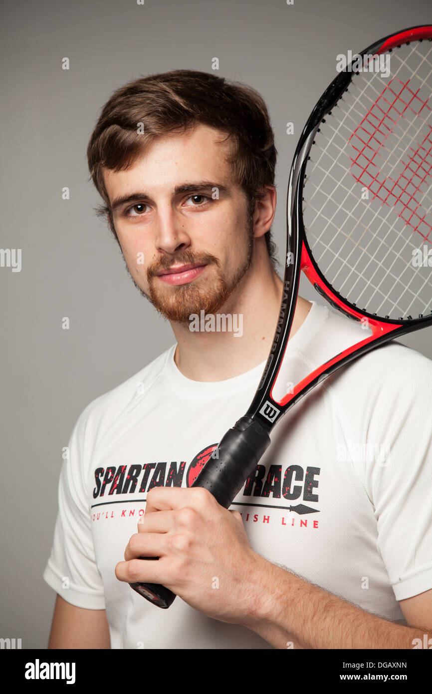 Fit male tennis player model Stock Photo - Alamy