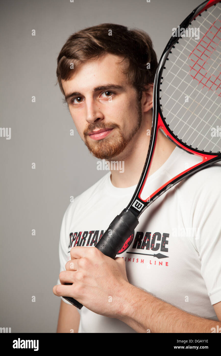 Fit male tennis player model Stock Photo - Alamy