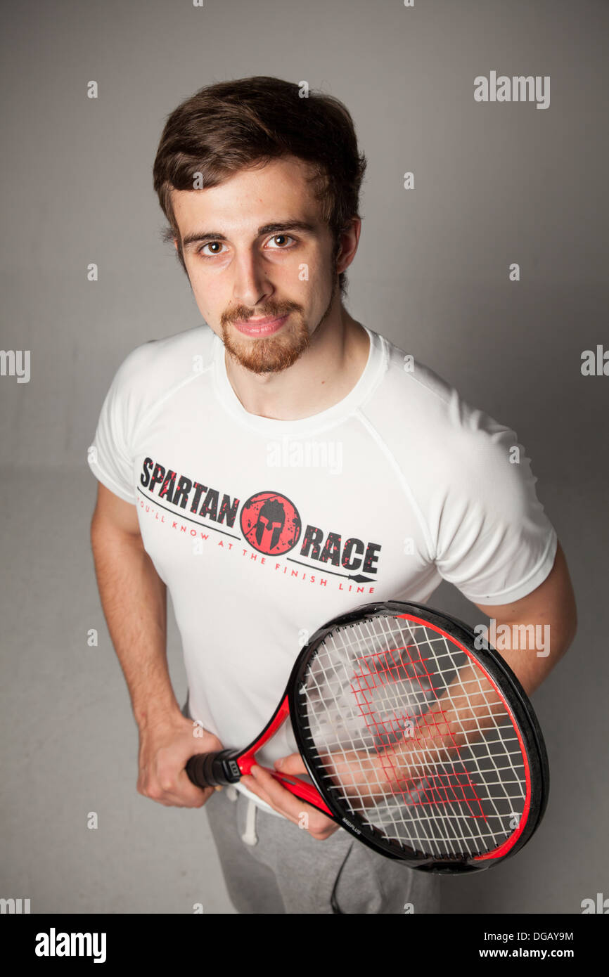 Fit male tennis player model Stock Photo - Alamy