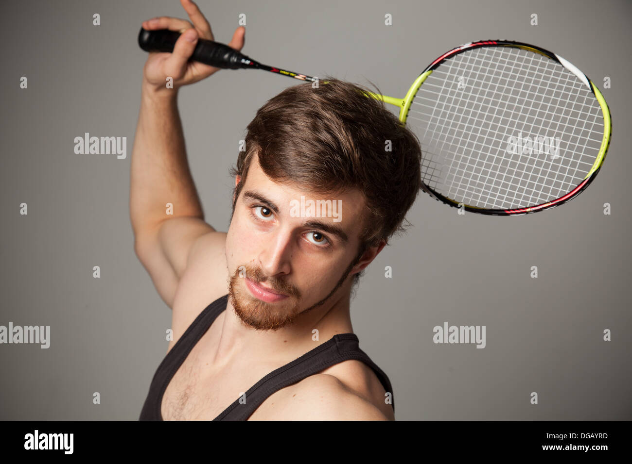 Fit male badminton player model Stock Photo - Alamy