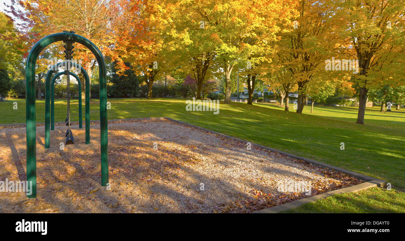 Swings in public park hi-res stock photography and images - Alamy