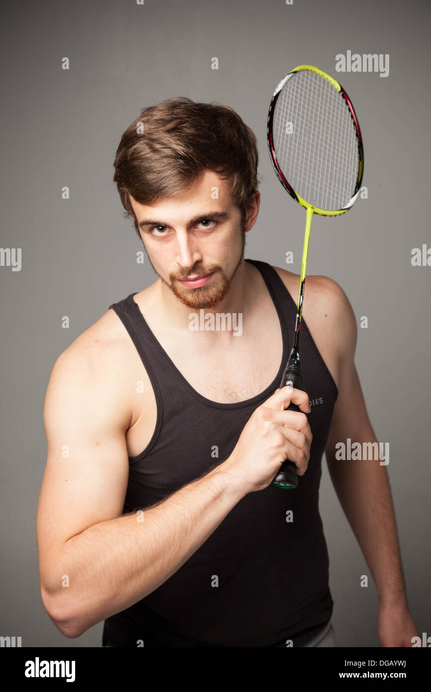 Fit male badminton player model Stock Photo - Alamy