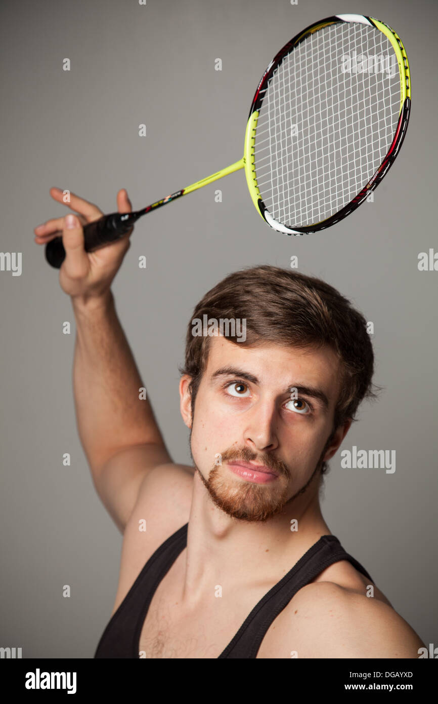 Fit male badminton player model Stock Photo - Alamy