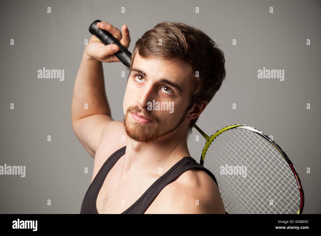 Fit male badminton player model Stock Photo - Alamy