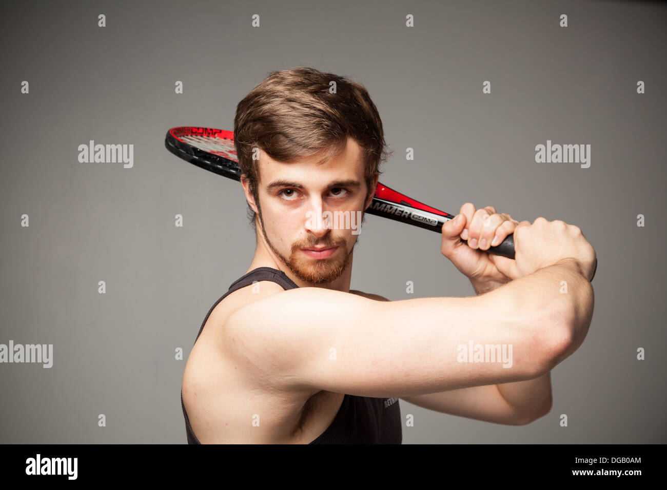 Fit male tennis player model Stock Photo - Alamy