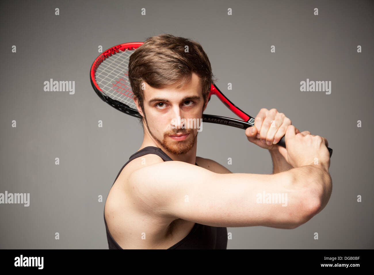 Fit male tennis player model Stock Photo - Alamy