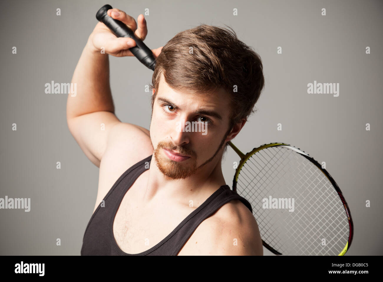 Fit male badminton player model Stock Photo - Alamy
