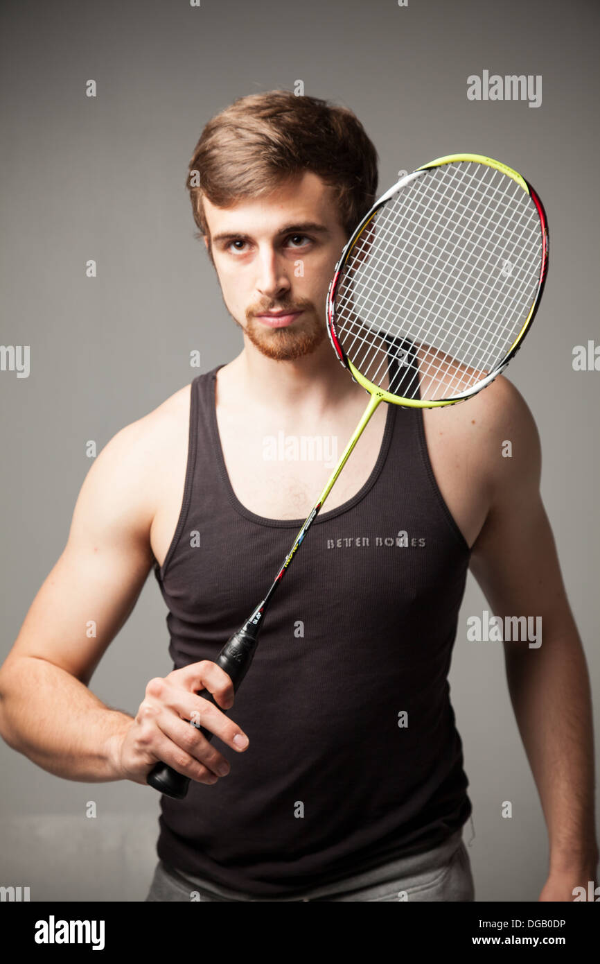 Fit male badminton player model Stock Photo - Alamy