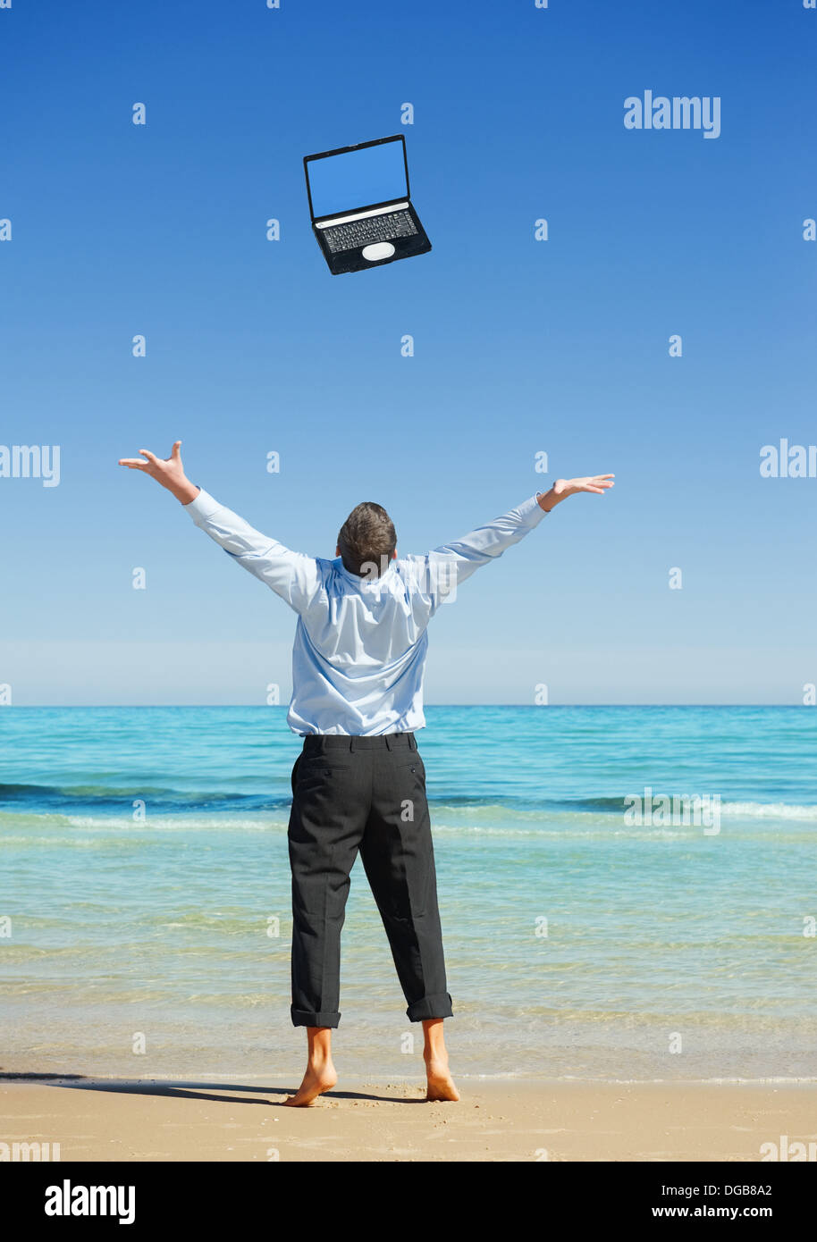 Dreams come true. First day of vacation.Businessman on the beach Stock ...