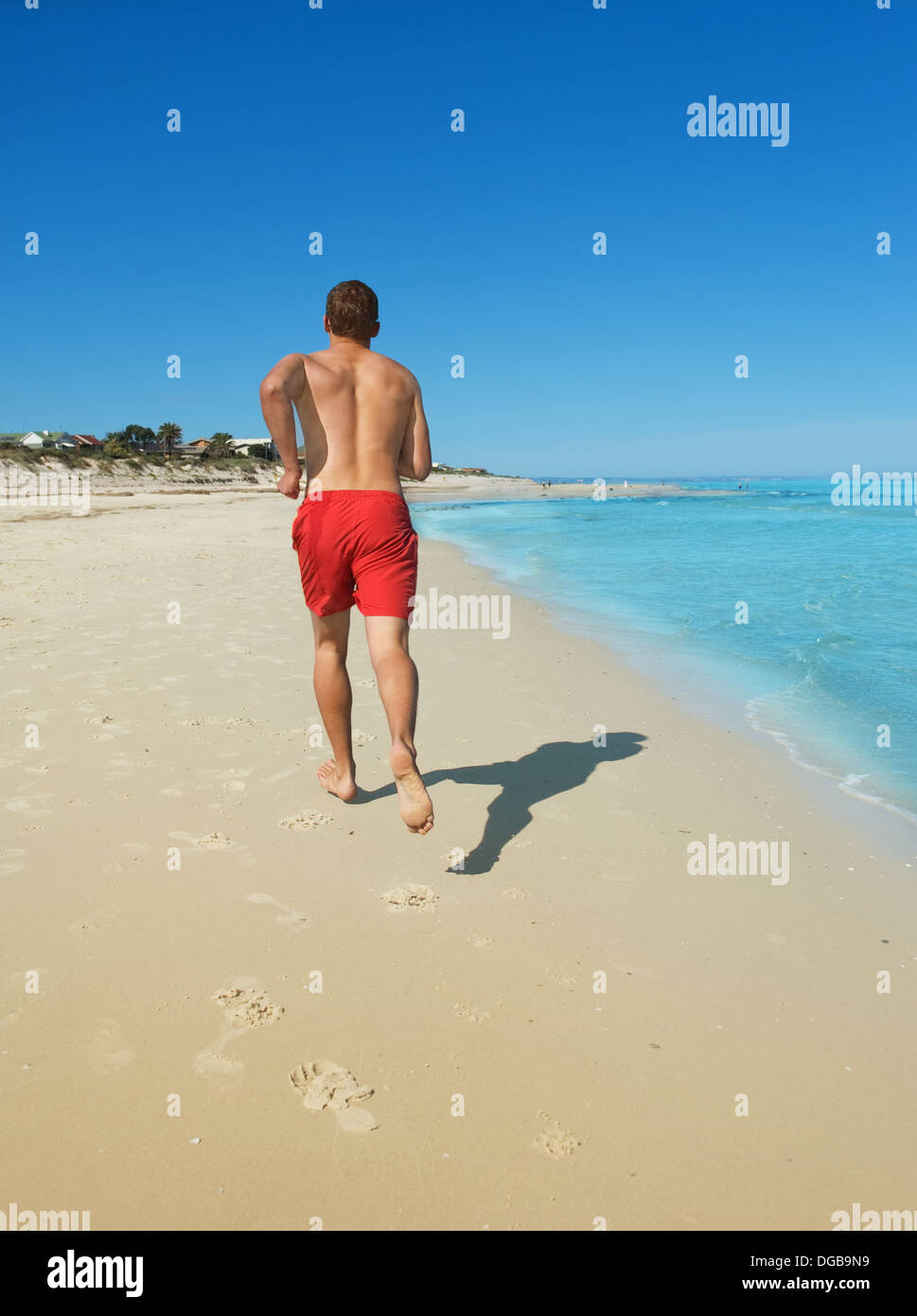 Running along the waves hi-res stock photography and images - Alamy
