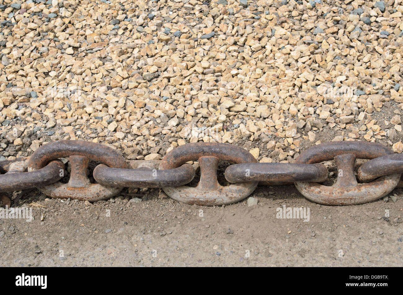 Big Chain on the Ground with Rock and Dirt Stock Photo - Alamy