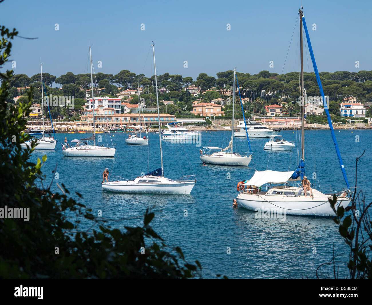 Pleasure boats at anchor in a bay down the coast from Antibes, France ...
