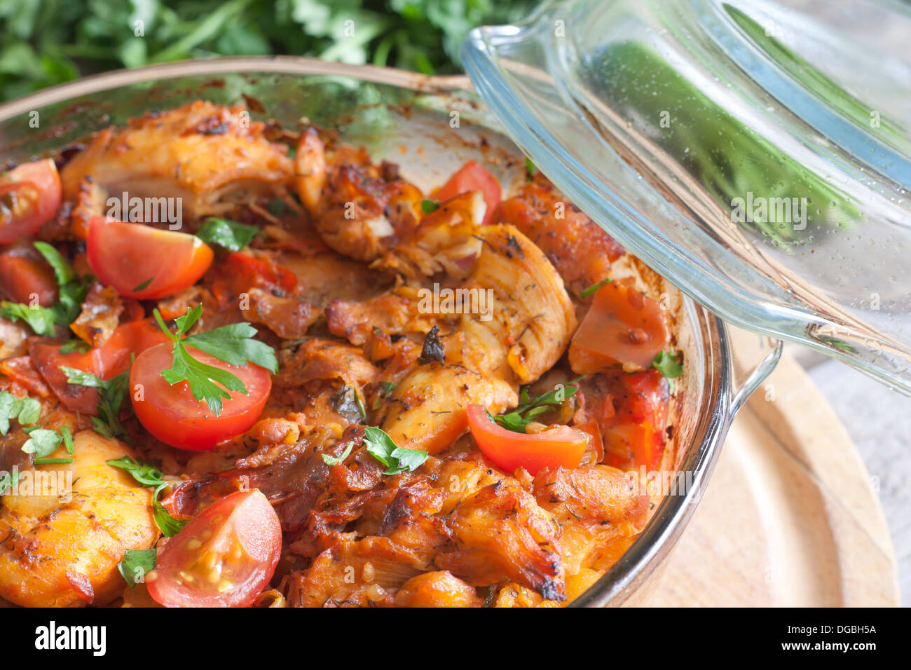 Casserole of chicken in an oven proof dish with vegetables Stock Photo ...