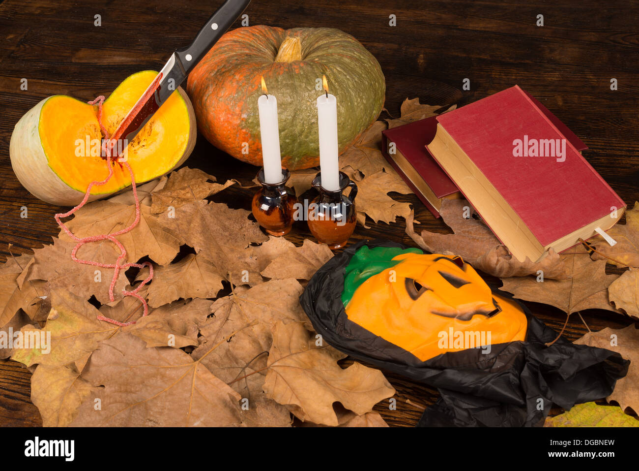 Book surrounded by spooky Halloween still life, a concept Stock Photo ...