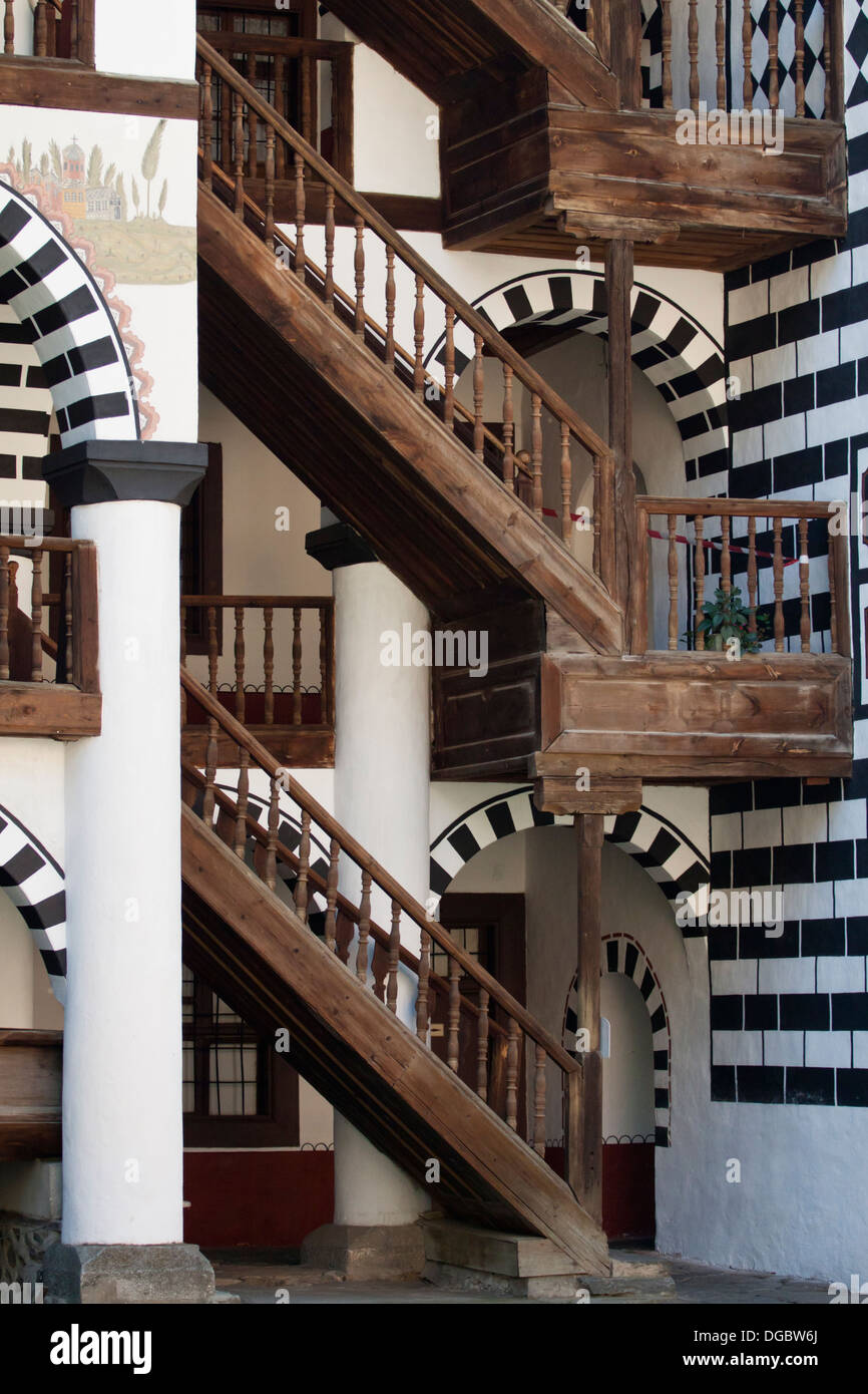 Wooden staircase leading to the monks quarters at the Rila Monastery ...