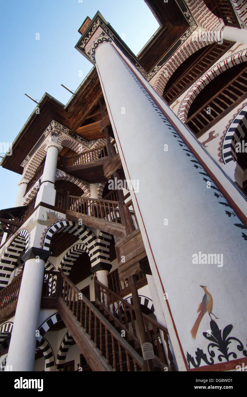 Wooden staircase and columns; monks quarters at the Rila Monastery ...