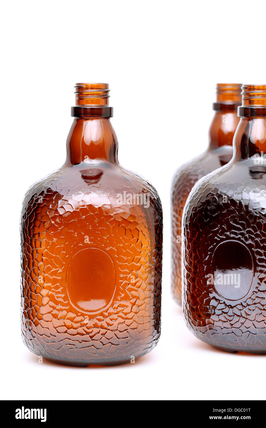Brown glass bottle on a white background Stock Photo - Alamy