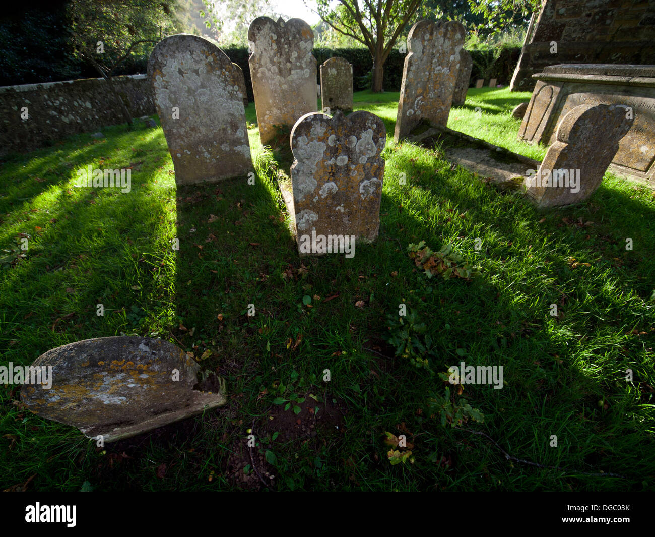 A graveyard in the church of the small village of Isfield Stock Photo ...
