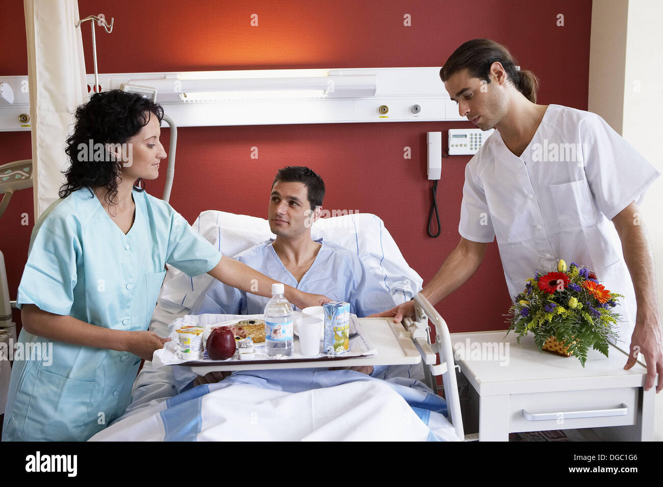 Nurses and patient in hospitalization Stock Photo - Alamy