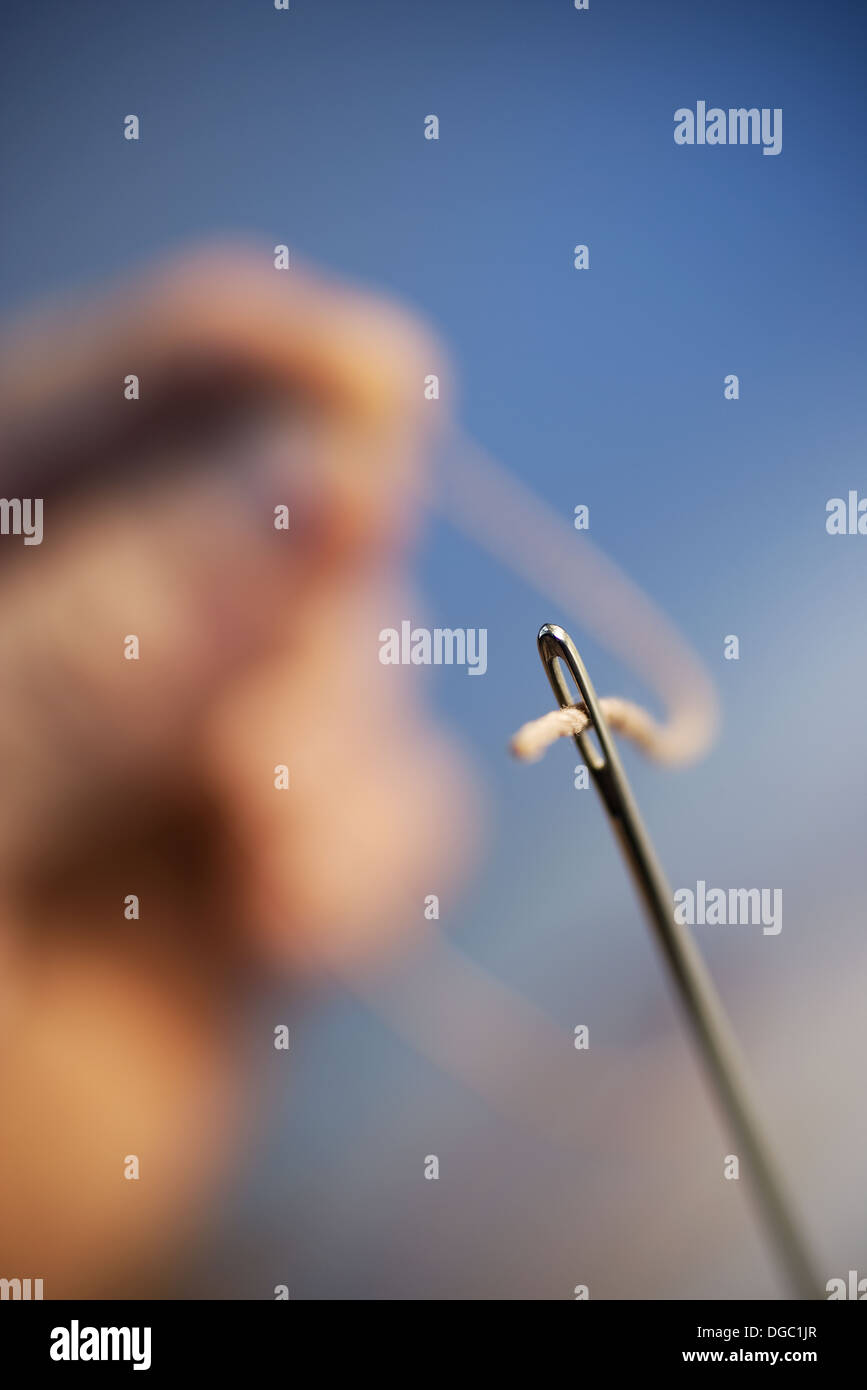 Small hole needle thread hi-res stock photography and images - Alamy