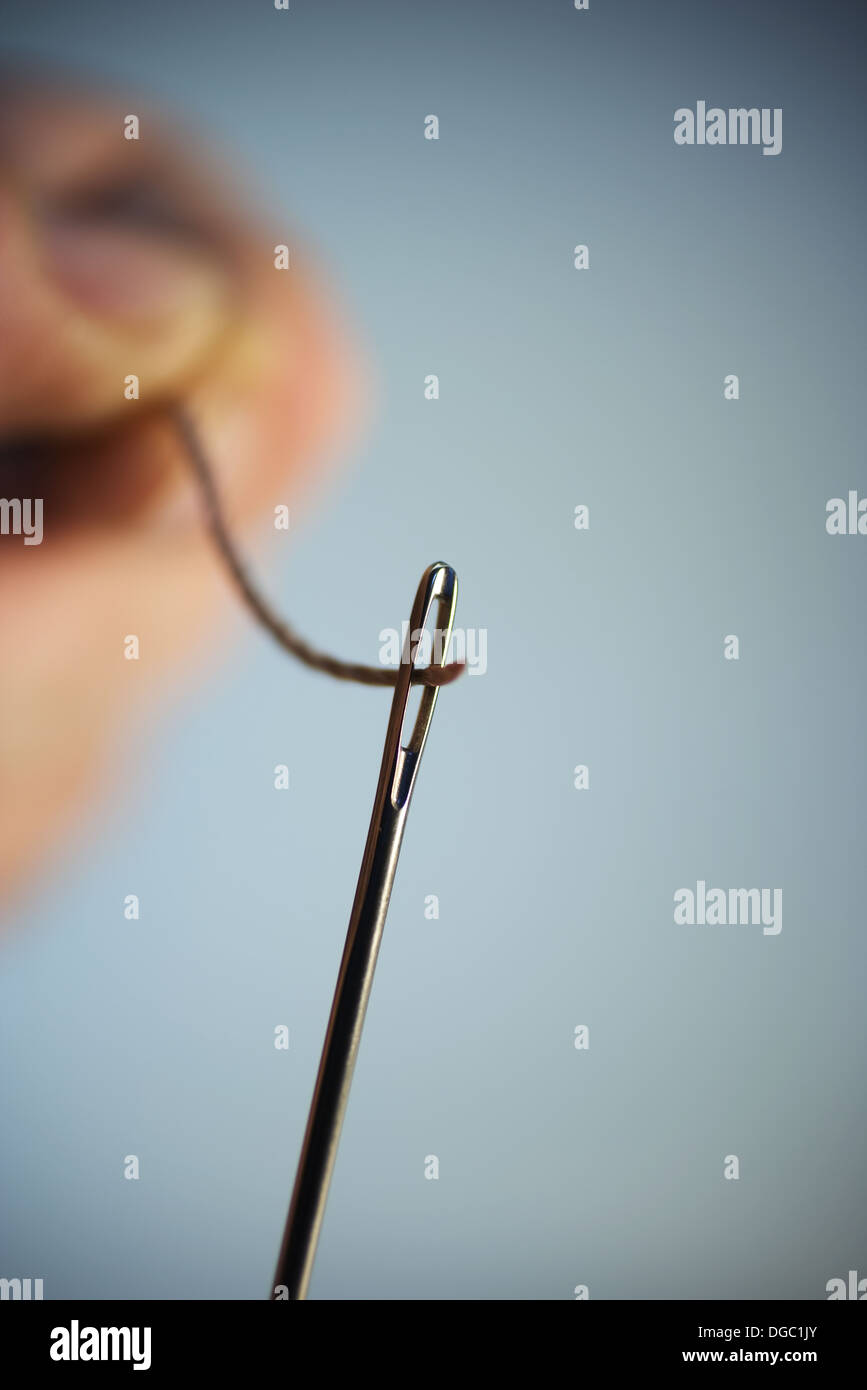 Small hole needle thread hi-res stock photography and images - Alamy