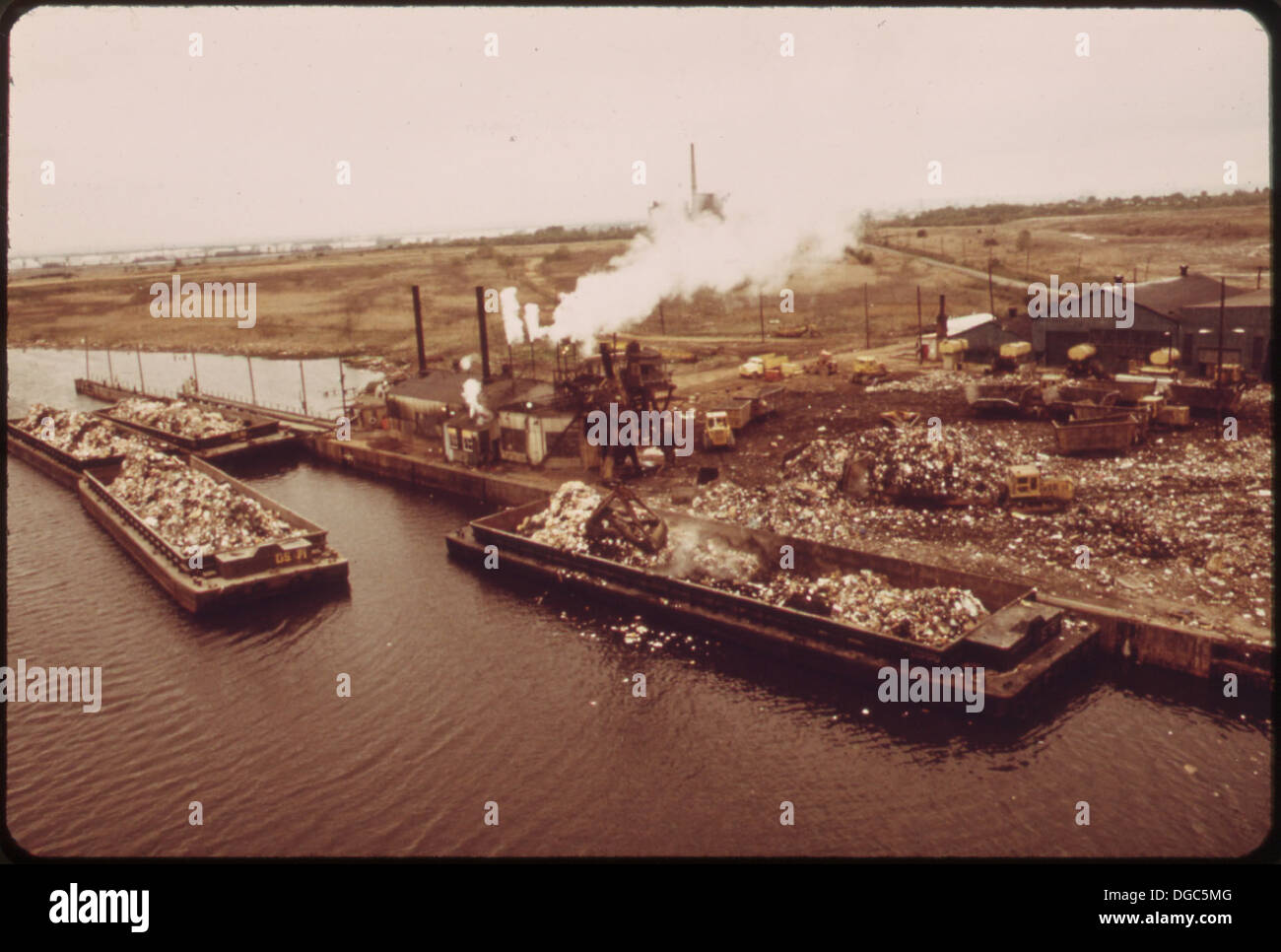 GARBAGE SCOWS BRING SOLID WASTE, FOR USE AS LANDFILL, TO FRESH KILLS ON ...