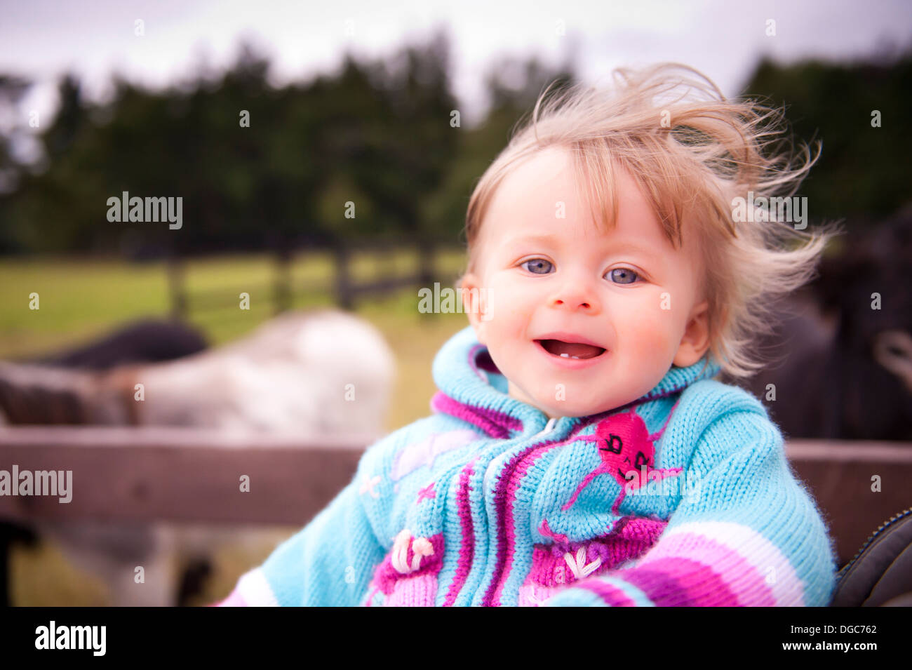 happy toddler with windswept hair Stock Photo - Alamy