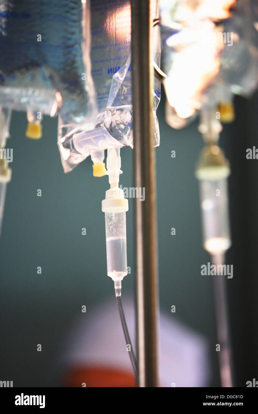 Intravenous bags hanging from intravenous stand Stock Photo - Alamy