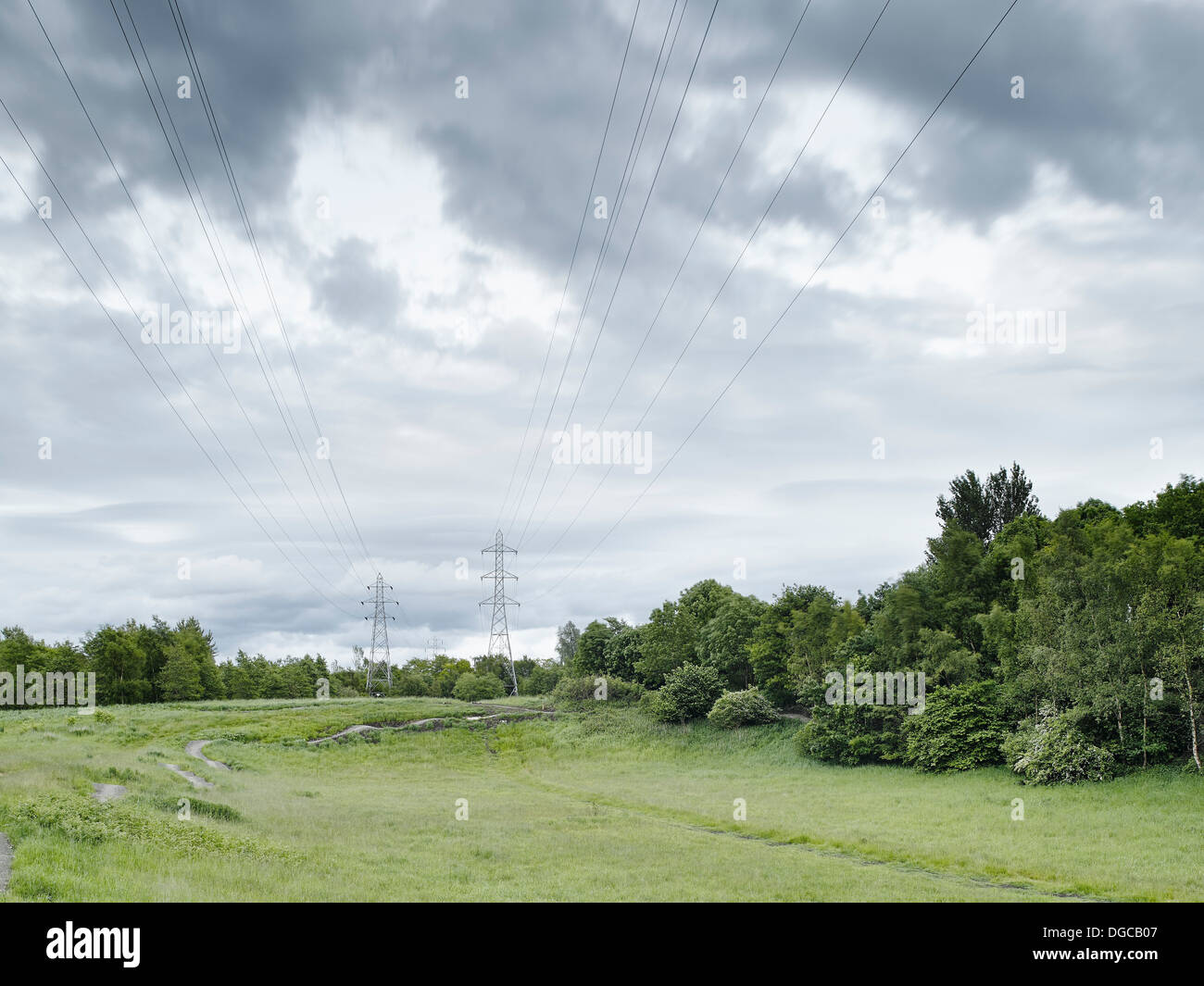 Pylon in field, Manchester, England Stock Photo - Alamy